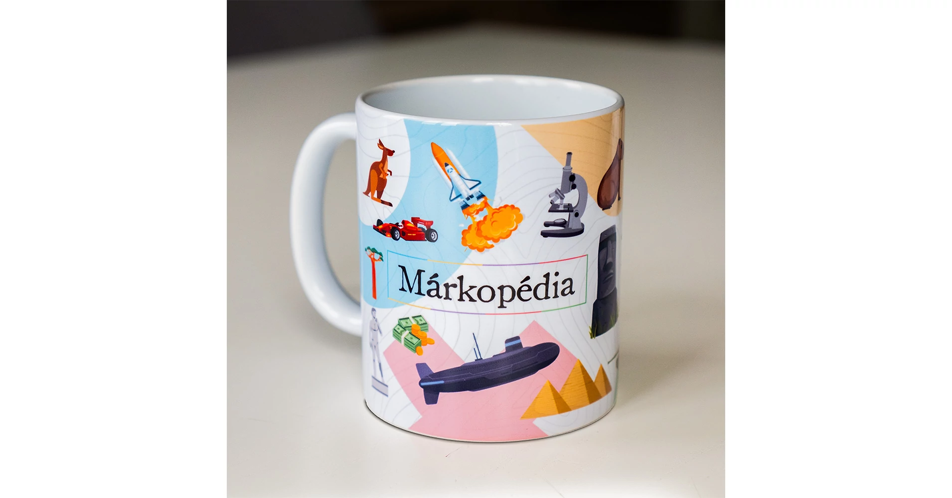 Márkopédia bögre (RAJZFIGURÁK) - Márkopédia Shop